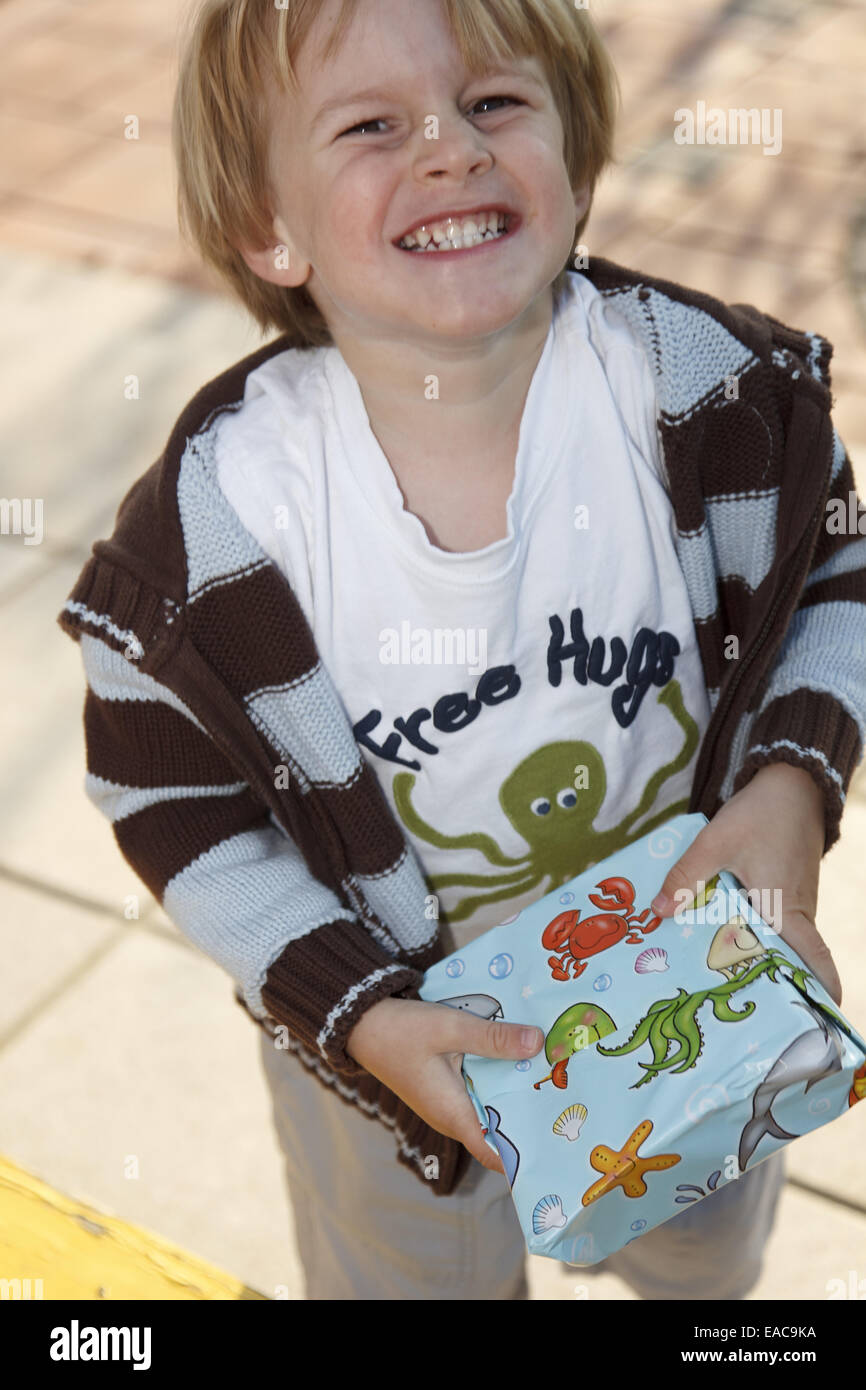 boy with present Stock Photo - Alamy