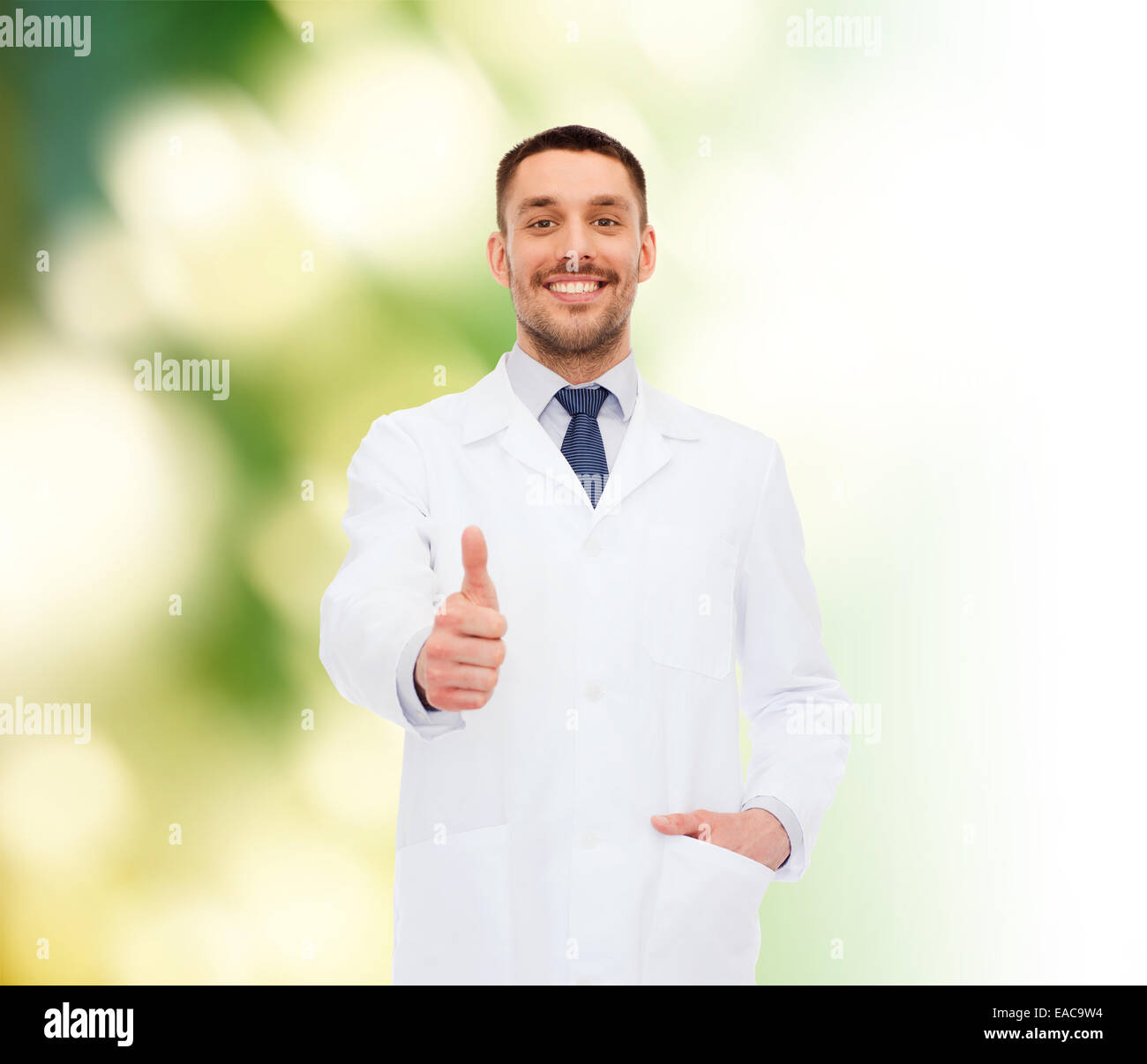 smiling male doctor showing thumbs up Stock Photo - Alamy