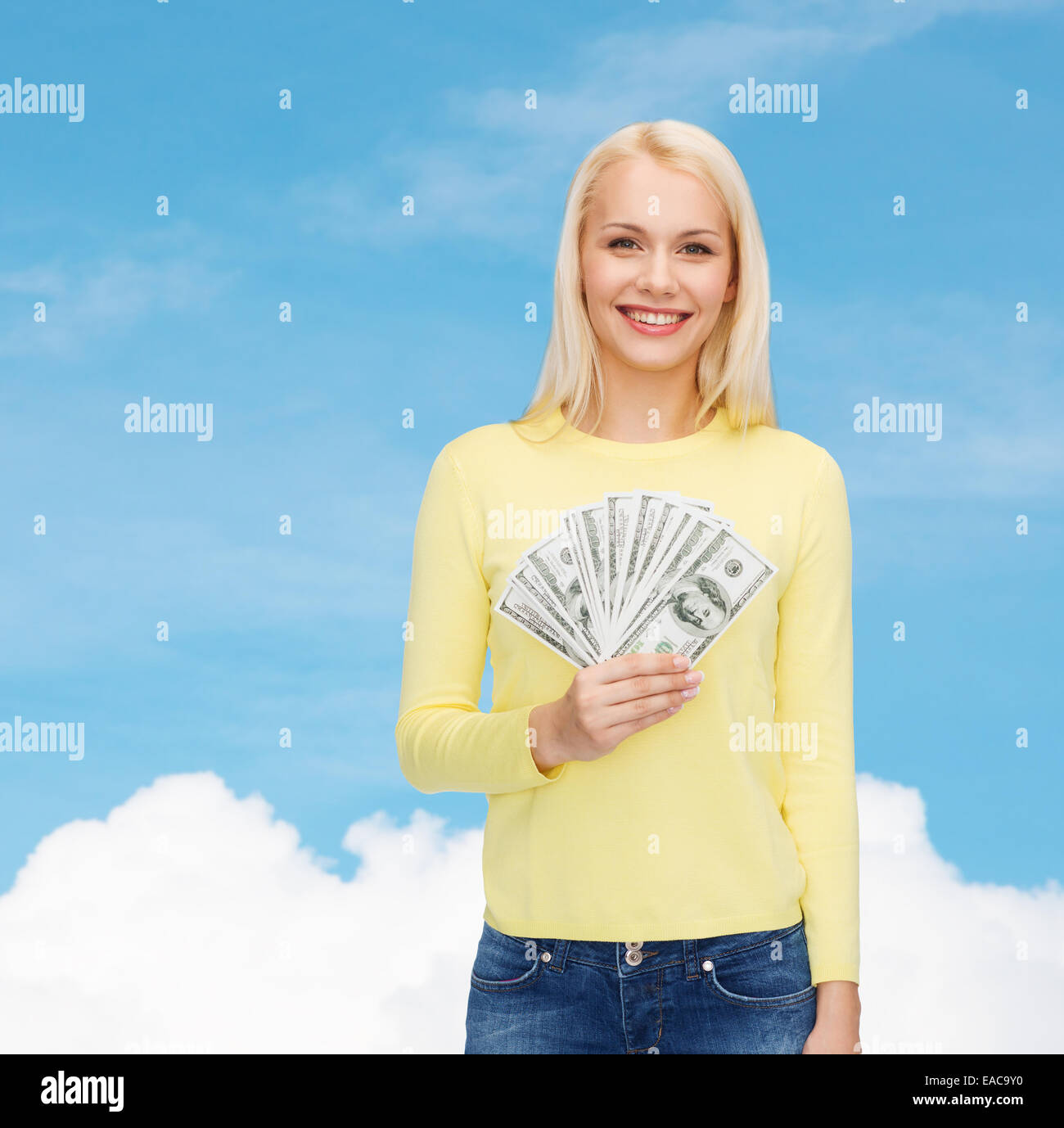 smiling girl with dollar cash money Stock Photo - Alamy
