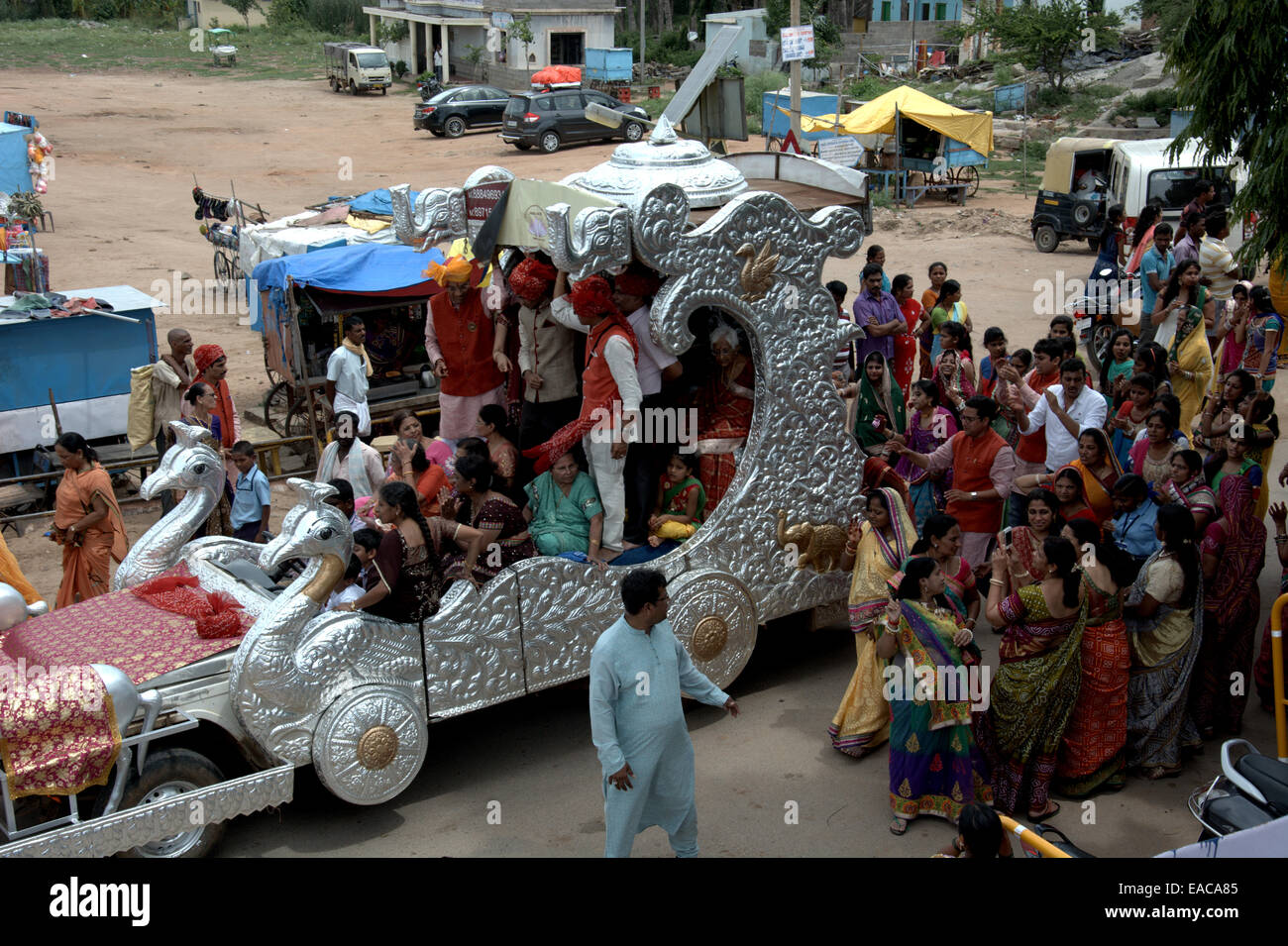 Jain religious procession / parade through street of Hampi, Karnataka ...