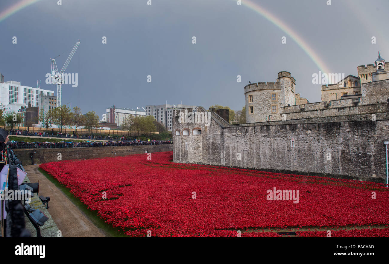 Visitors are treated to a rainbow while visiting the ceramic poppies at ...