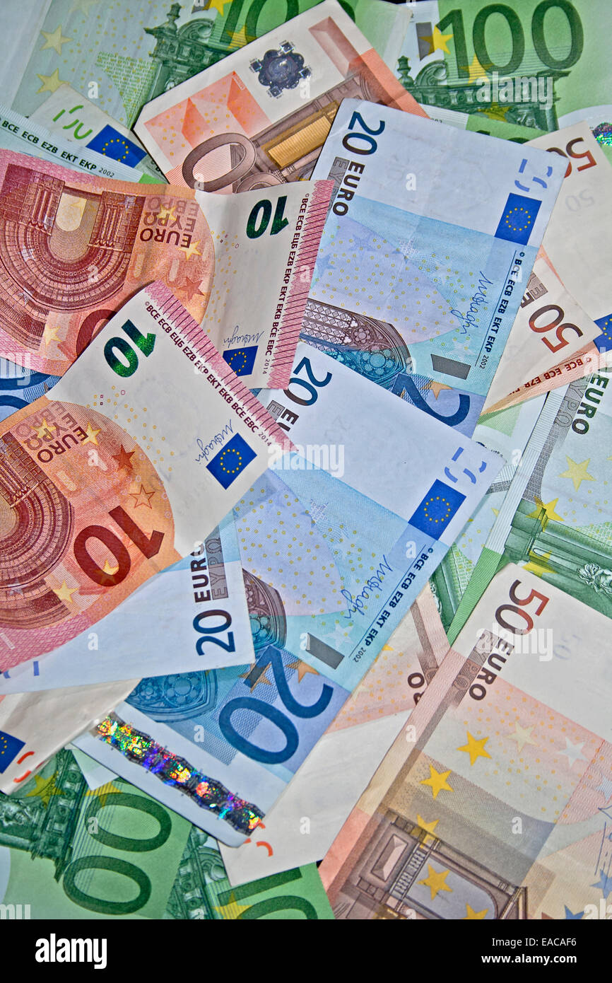 Lots of money cash Stock Photo - Alamy