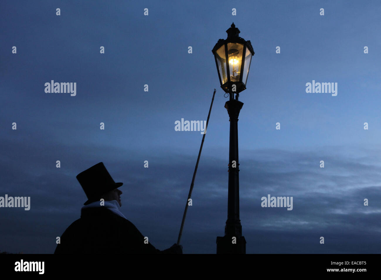 Lamplighter lighting gas street light hi-res stock photography and ...