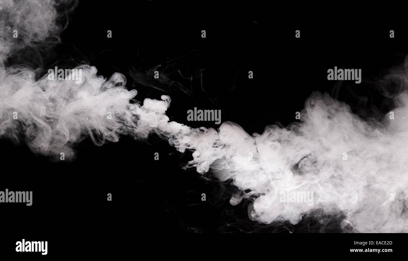 Freeze motion of white dust explosion isolated on black background ...