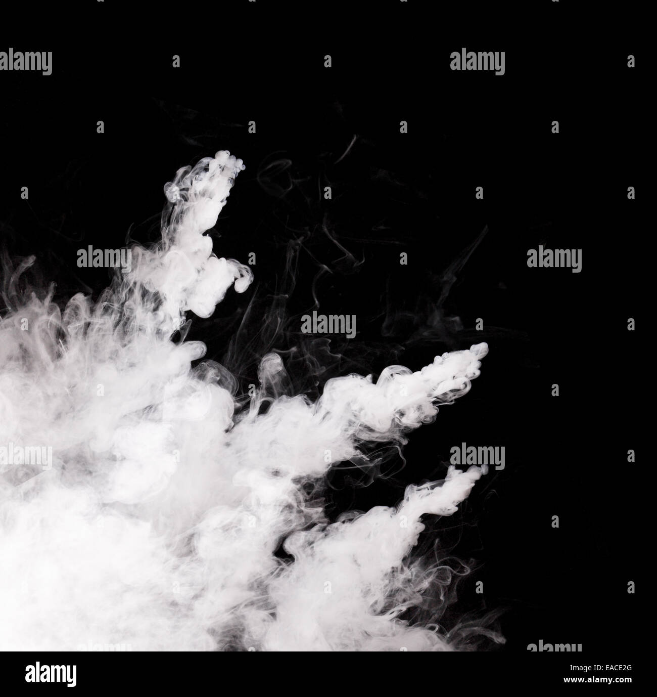 Freeze motion of white dust explosion isolated on black background ...