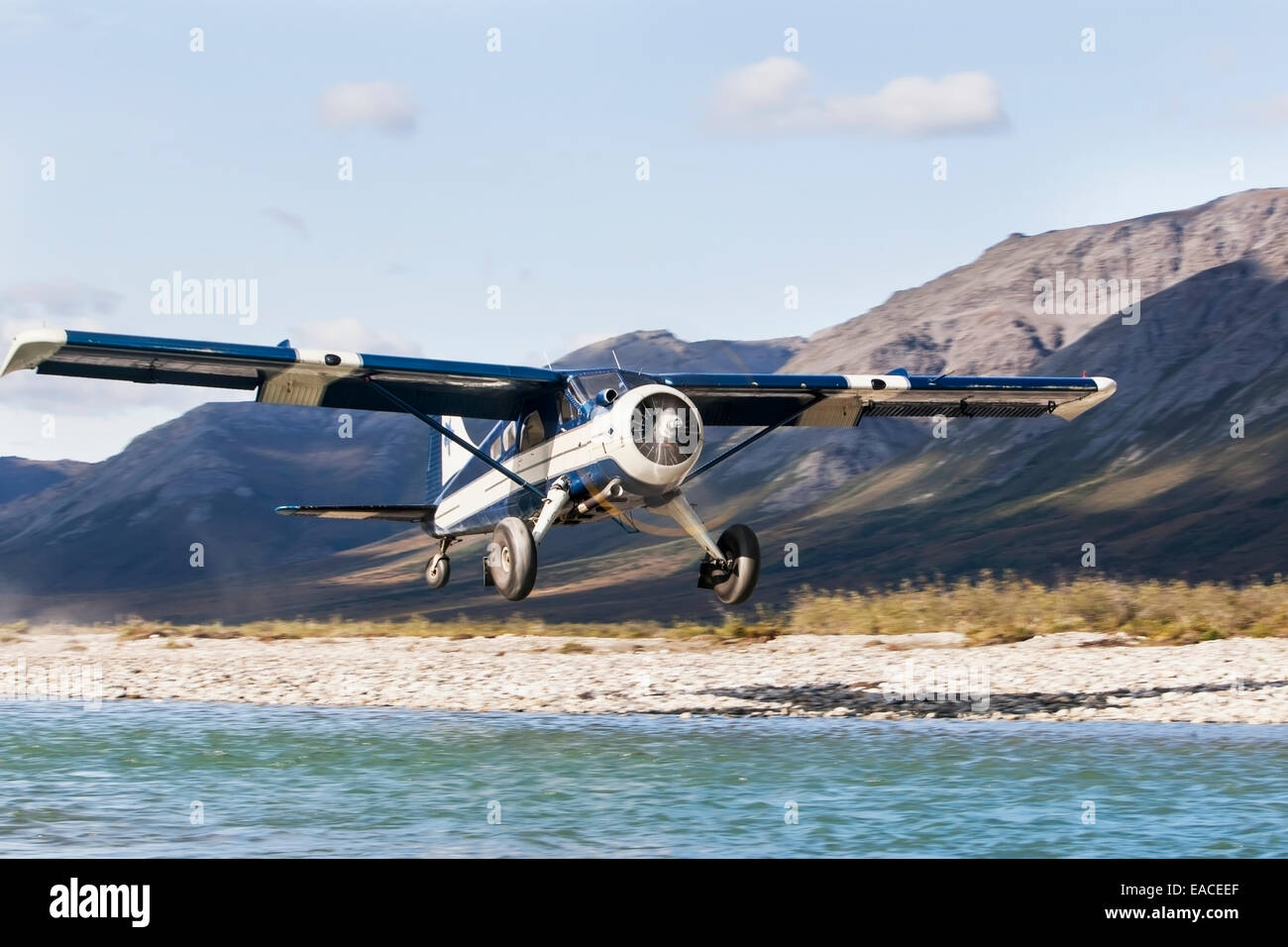 Bushplane taking off over the Noatak River, Brooks Range, Arctic Alaska ...