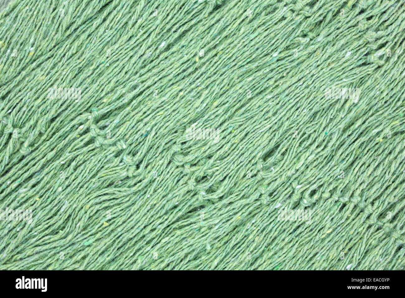 A very close view of a new green dyed craft fishnet Stock Photo - Alamy
