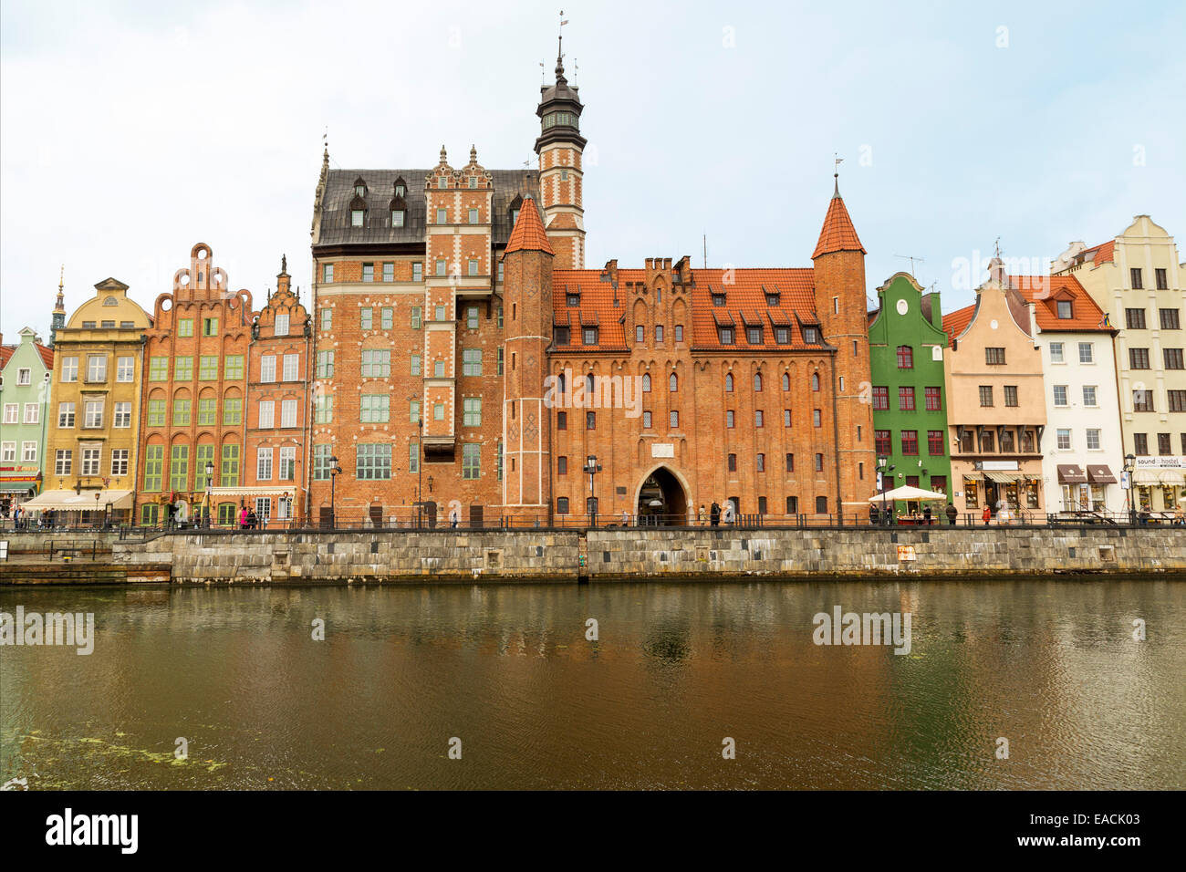 The classic view of Gdansk with the Hanseatic-style buildings reflected ...