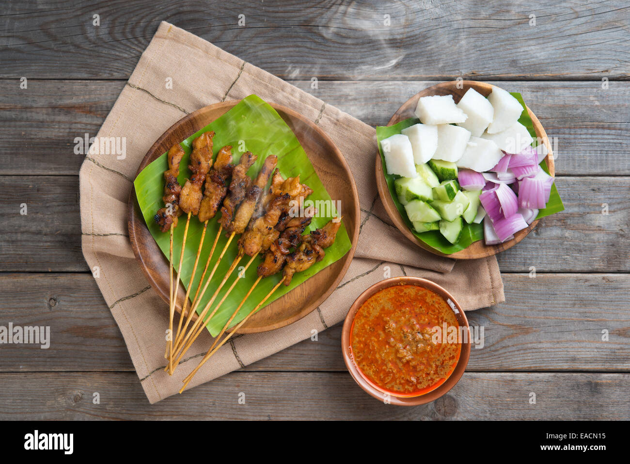 Hot and spicy Asian dish. Delicious chicken sate or satay, skewered and ...
