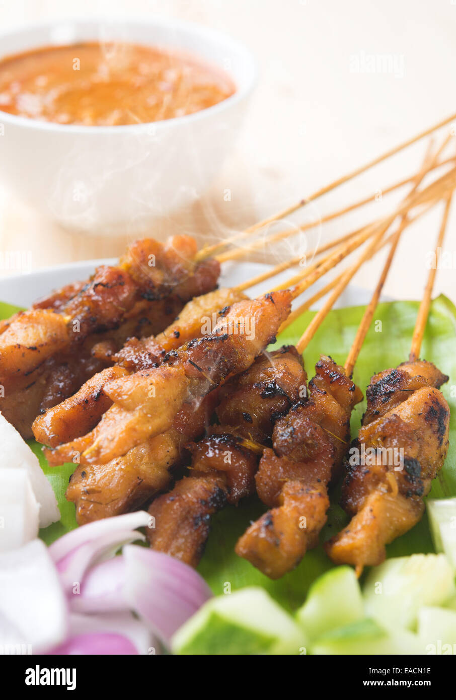 Chicken sate or satay, skewered and grilled meat, served with peanut ...