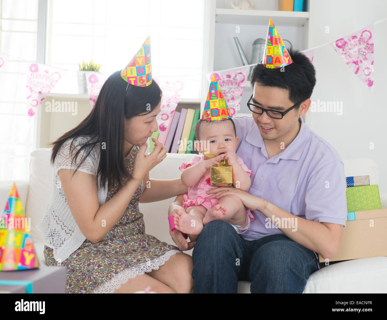asian family celebrating full moon birthday with baby Stock Photo - Alamy