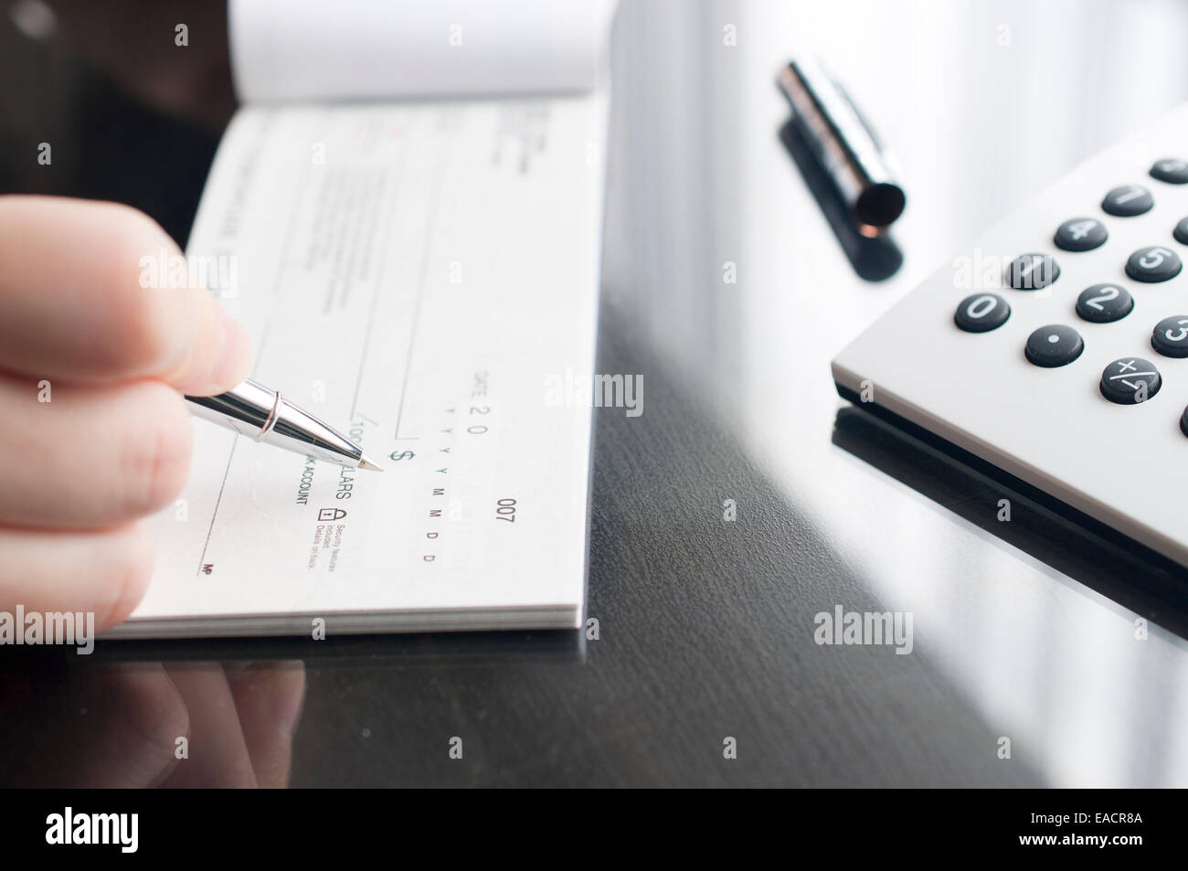 Woman writing with pen hi-res stock photography and images - Alamy