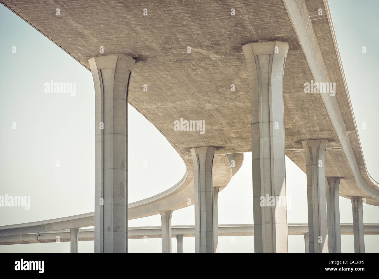 Freeway overpass intersection from below Stock Photo - Alamy