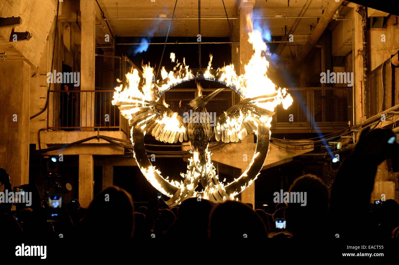 Berlin, Germany. 11th Nov, 2014. The Mockingjay symbol burning at the ...