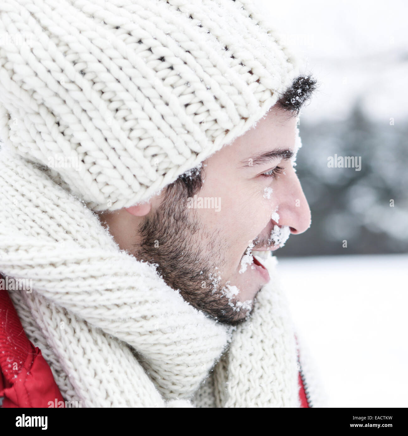 Man in winter with snow in his face at a snowball fight Stock Photo - Alamy
