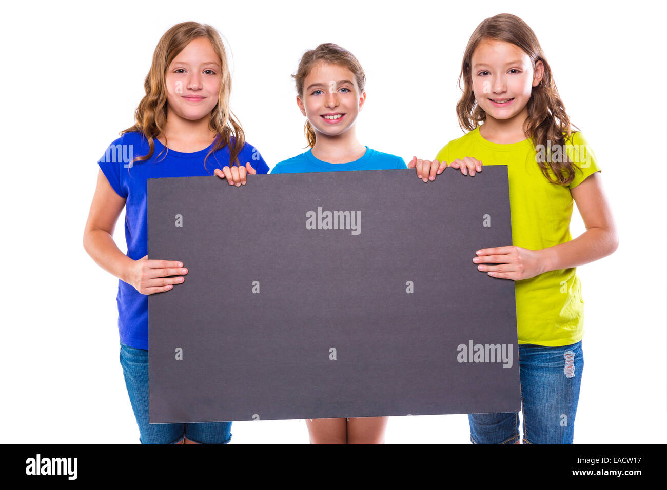 happy kid girls holding black board copyspace on white background Stock ...