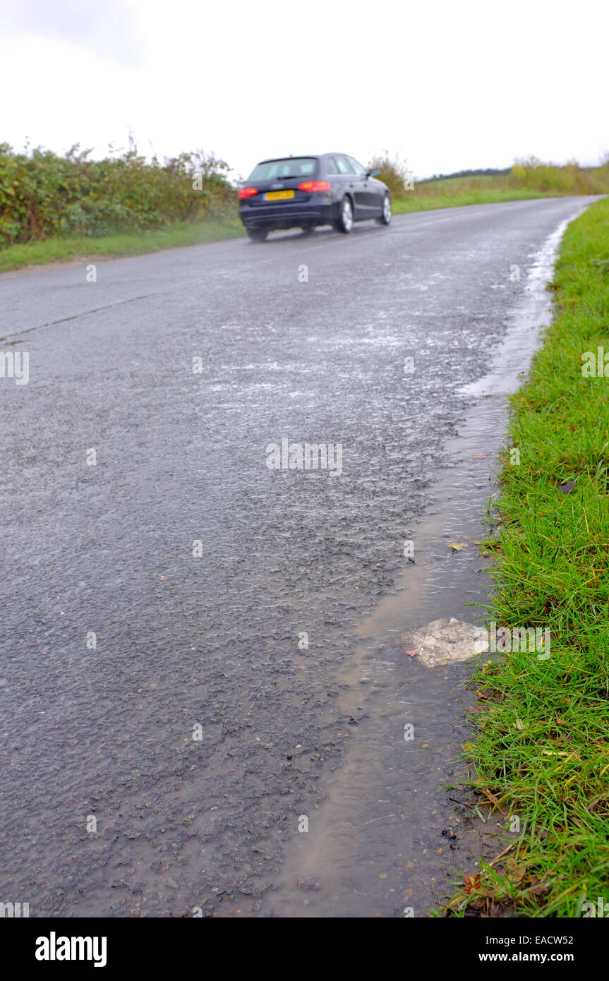 Car driving in wet weather Stock Photo - Alamy