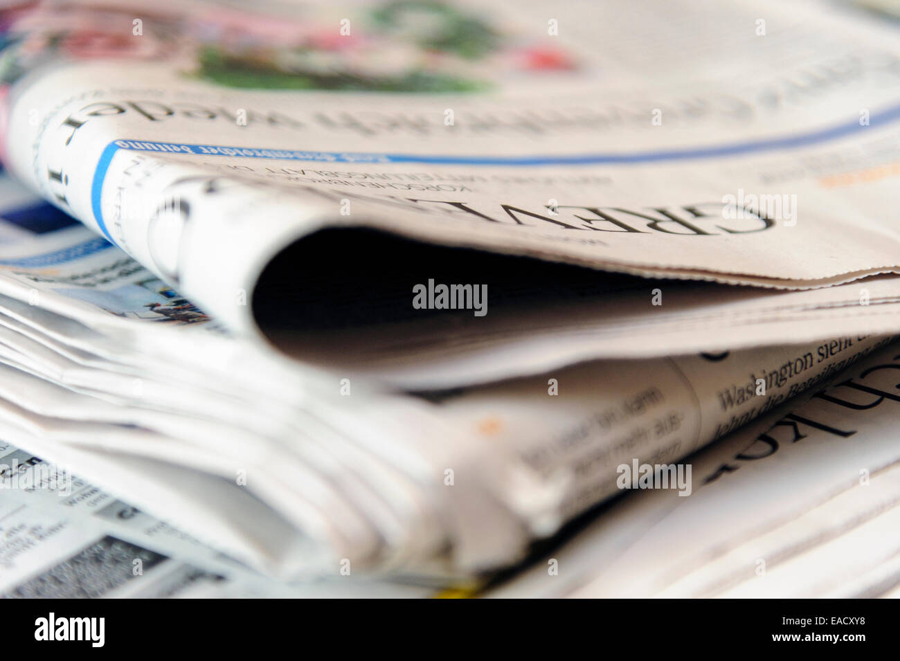 Folded newspapers, Germany Stock Photo - Alamy