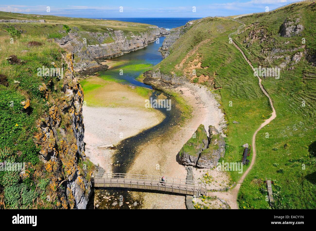 Sea inlet with a trail to a viewpoint at Smoo Cave, Durness, Caithness ...