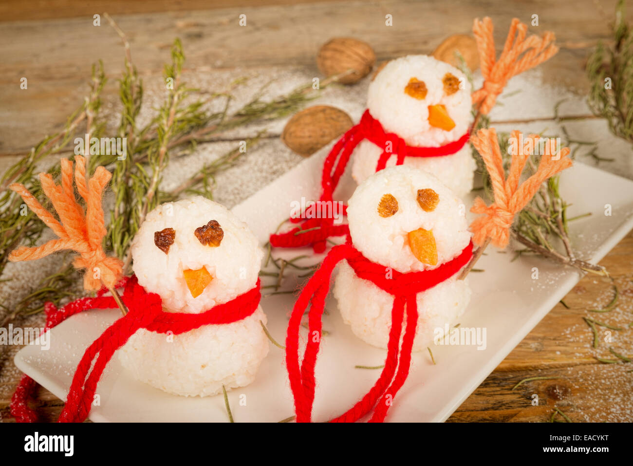 Funny rice snowmen, a kid meal for Christmas Stock Photo - Alamy