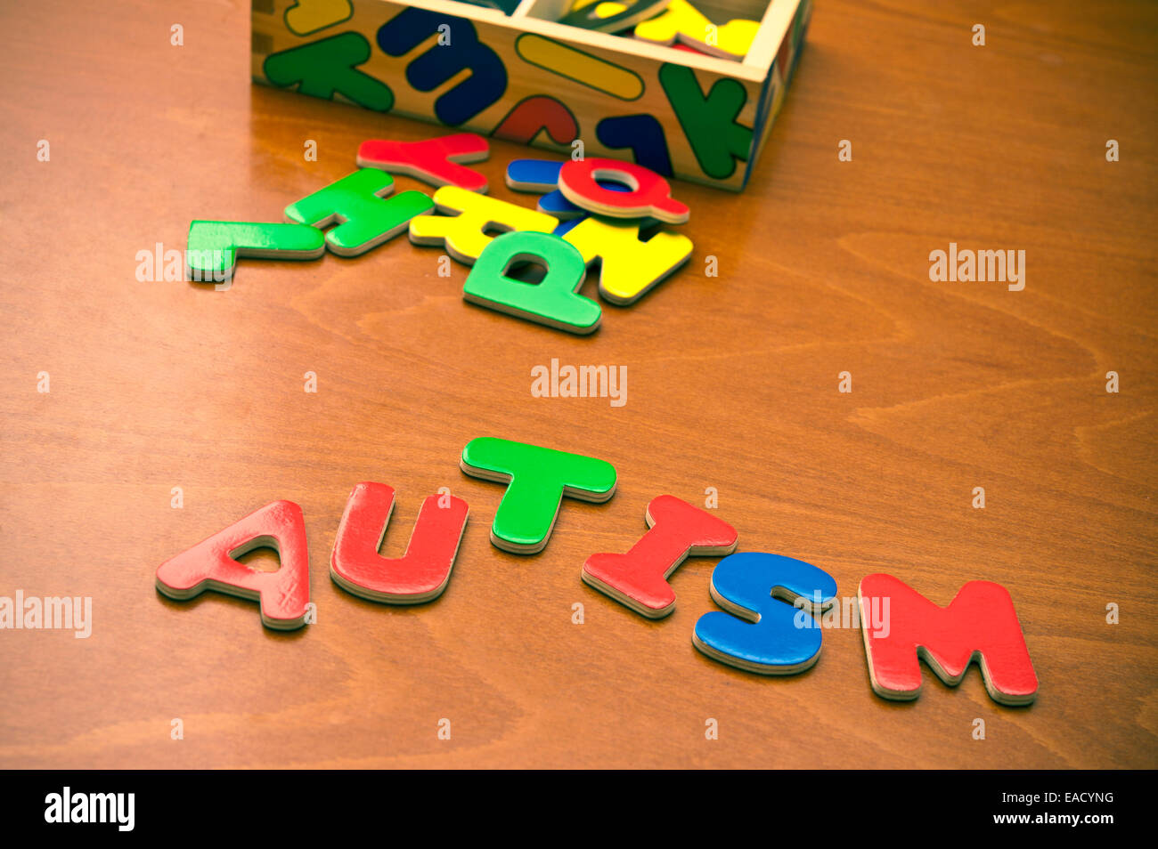 word autism written with colorful kids magnetic letters Stock Photo - Alamy