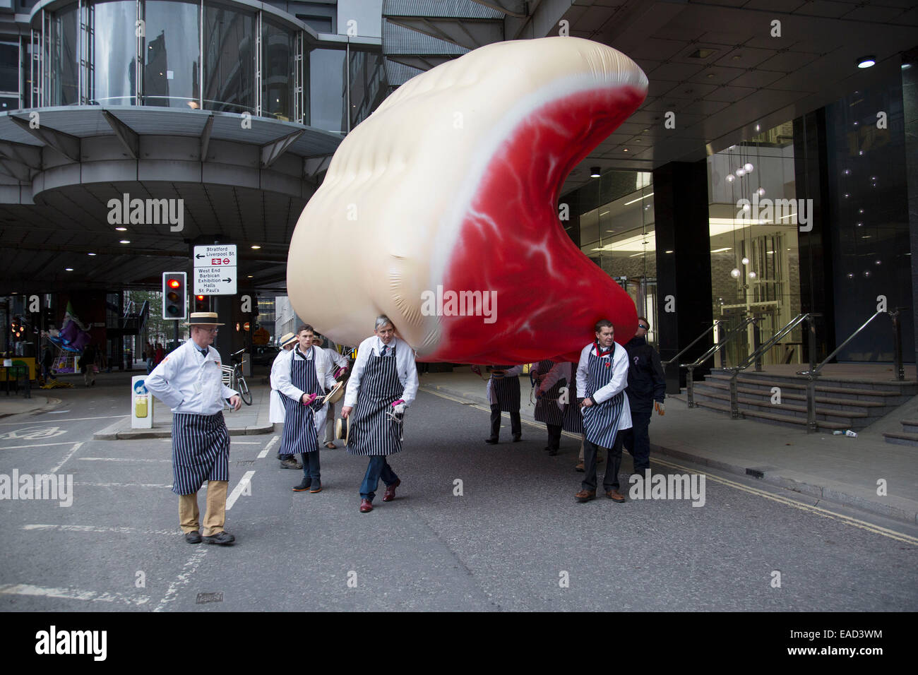 Butchers manoeuvre a giant inflatable lamb chop. The Lord Mayor's Show ...