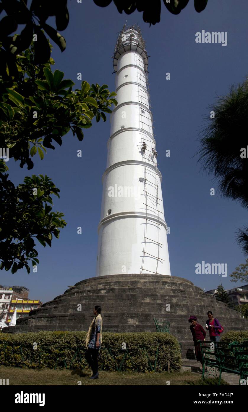 Kathmandu, Nepal. 12th Nov, 2014. Nepalese workers paint the Dharara ...