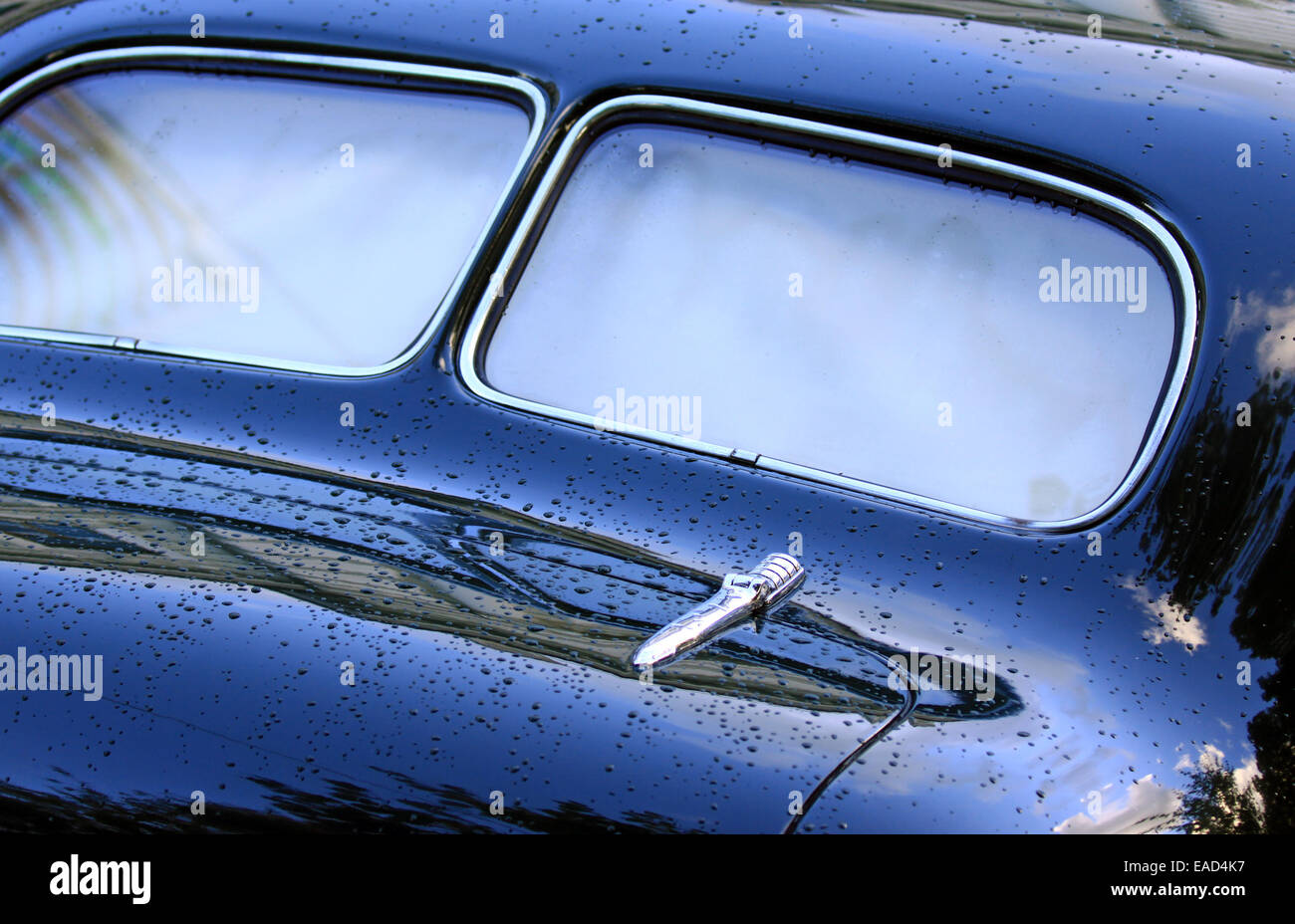 Rear window view of blue vintage car Stock Photo - Alamy