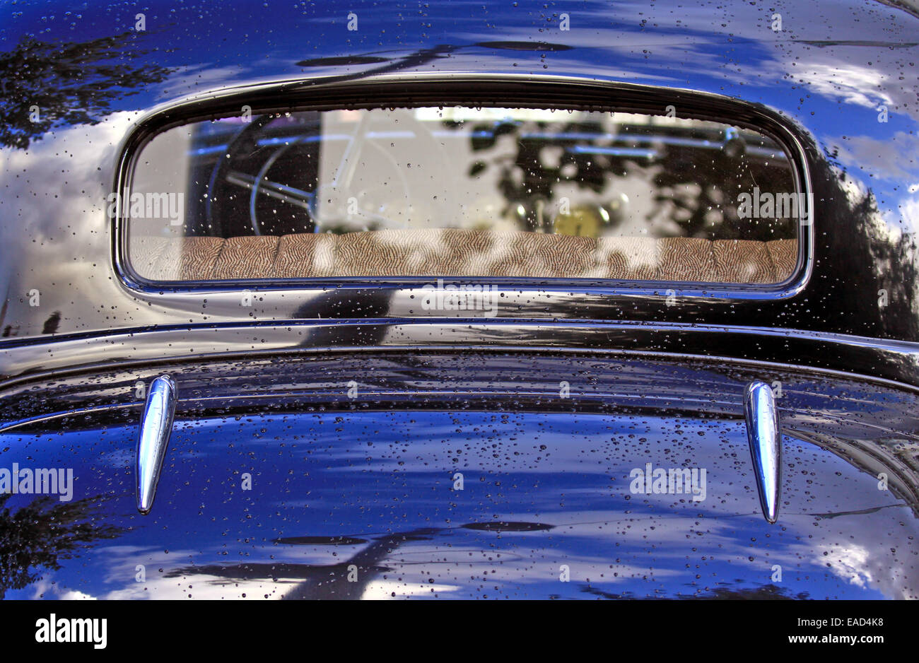 Rear view of blue vintage car detail Stock Photo - Alamy