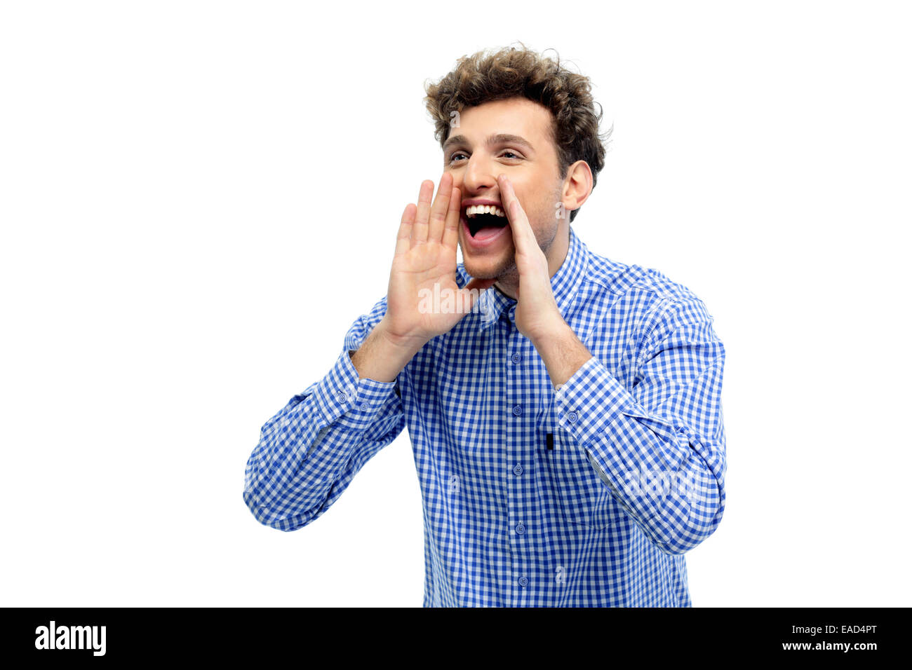 Portrait of a young man shouting loud with hands on the mouth Stock ...