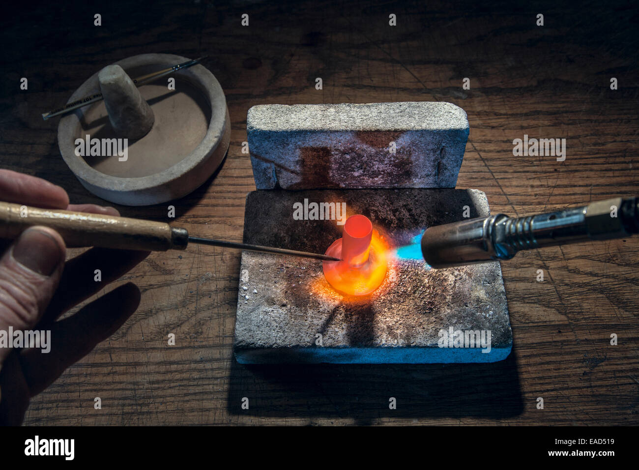 Blowlamp being used to solder silver Stock Photo - Alamy