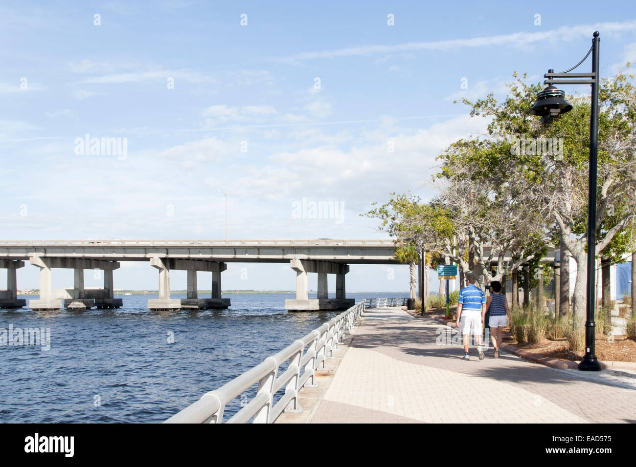 Mature couple walking on the Riverwalk at Rossi Park, Bradenton ...