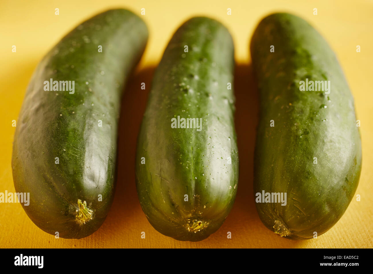 Whole fresh cucumbers Stock Photo - Alamy