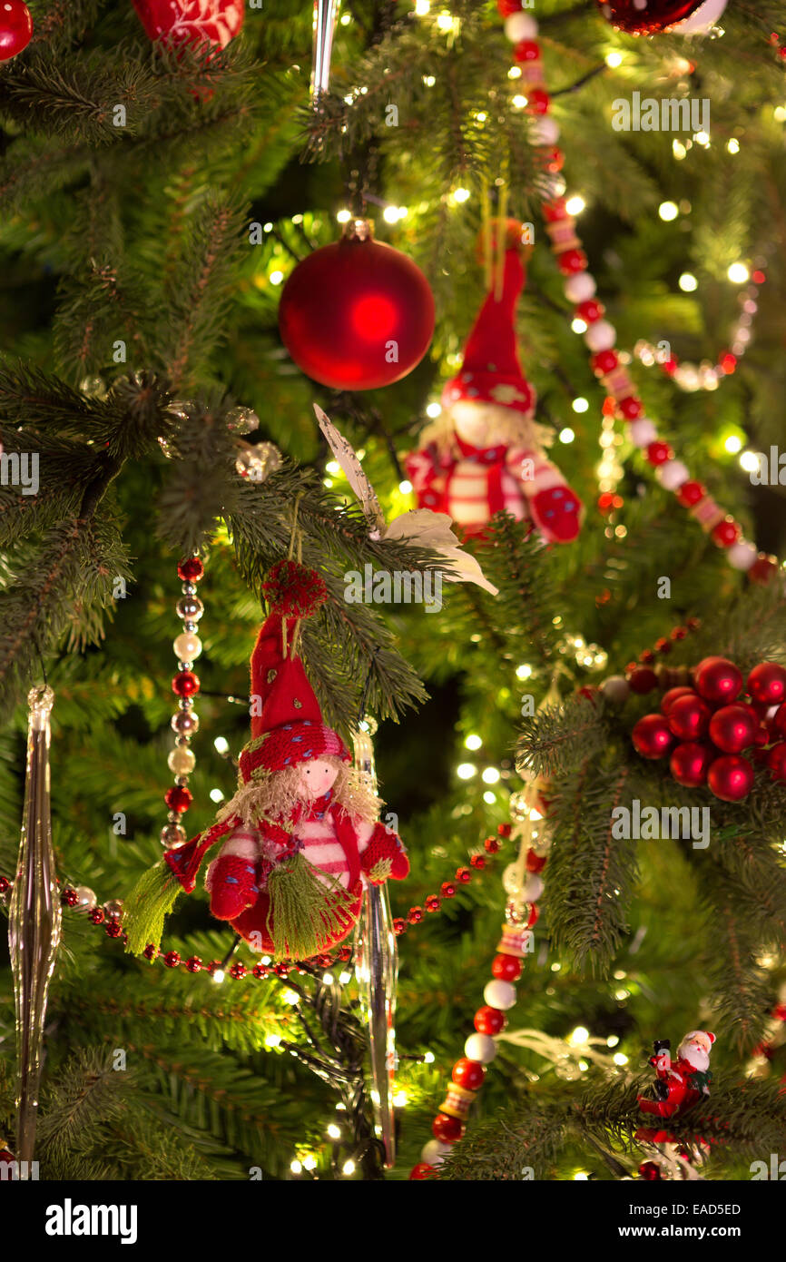 Detail of little santa puppets hanging in a christmas tree Stock Photo ...