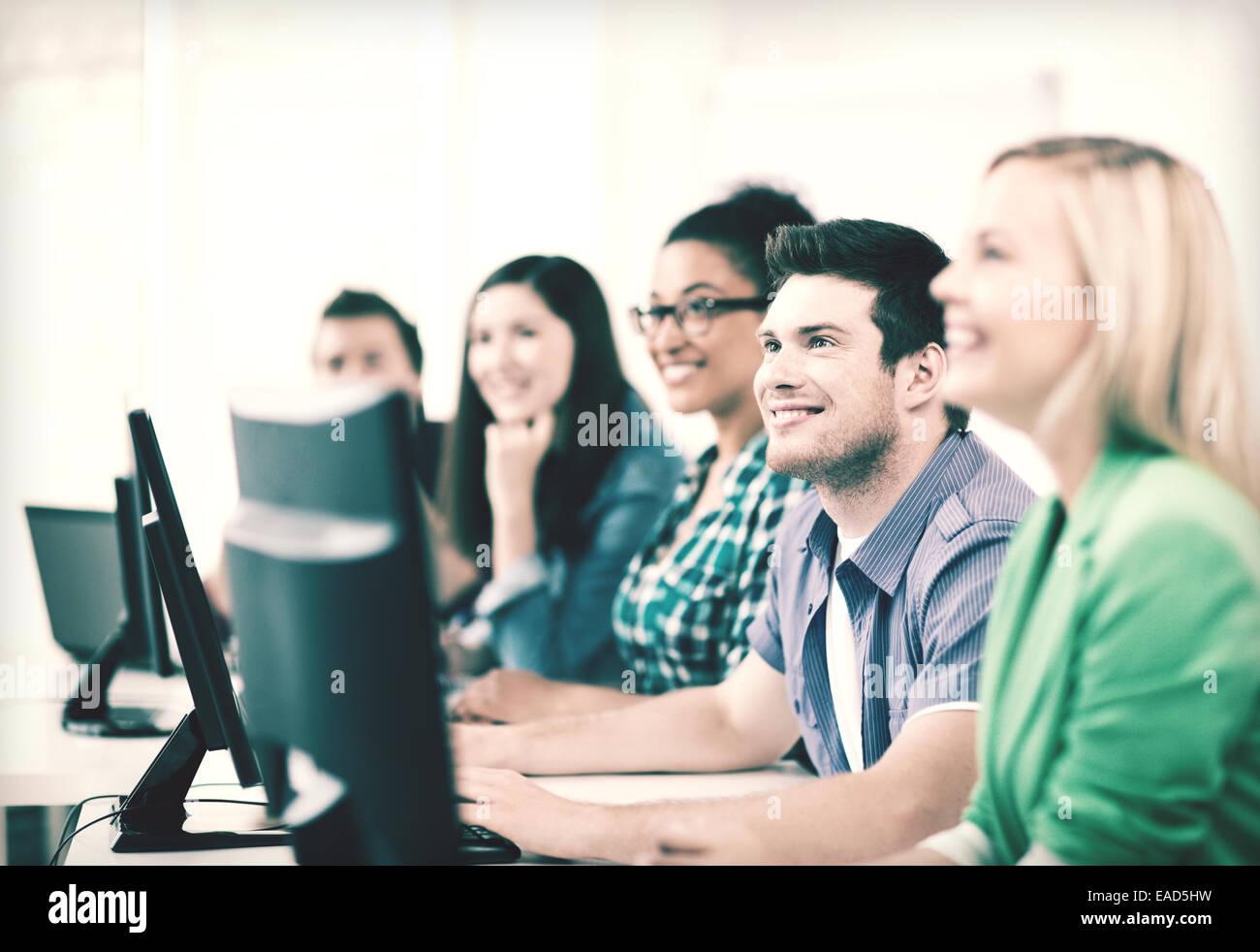 students with computers studying at school Stock Photo - Alamy