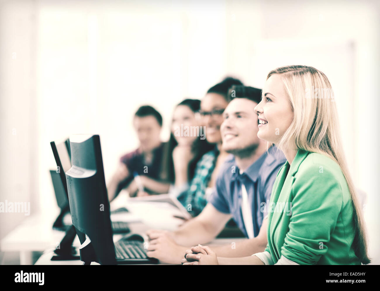 students with computers studying at school Stock Photo - Alamy