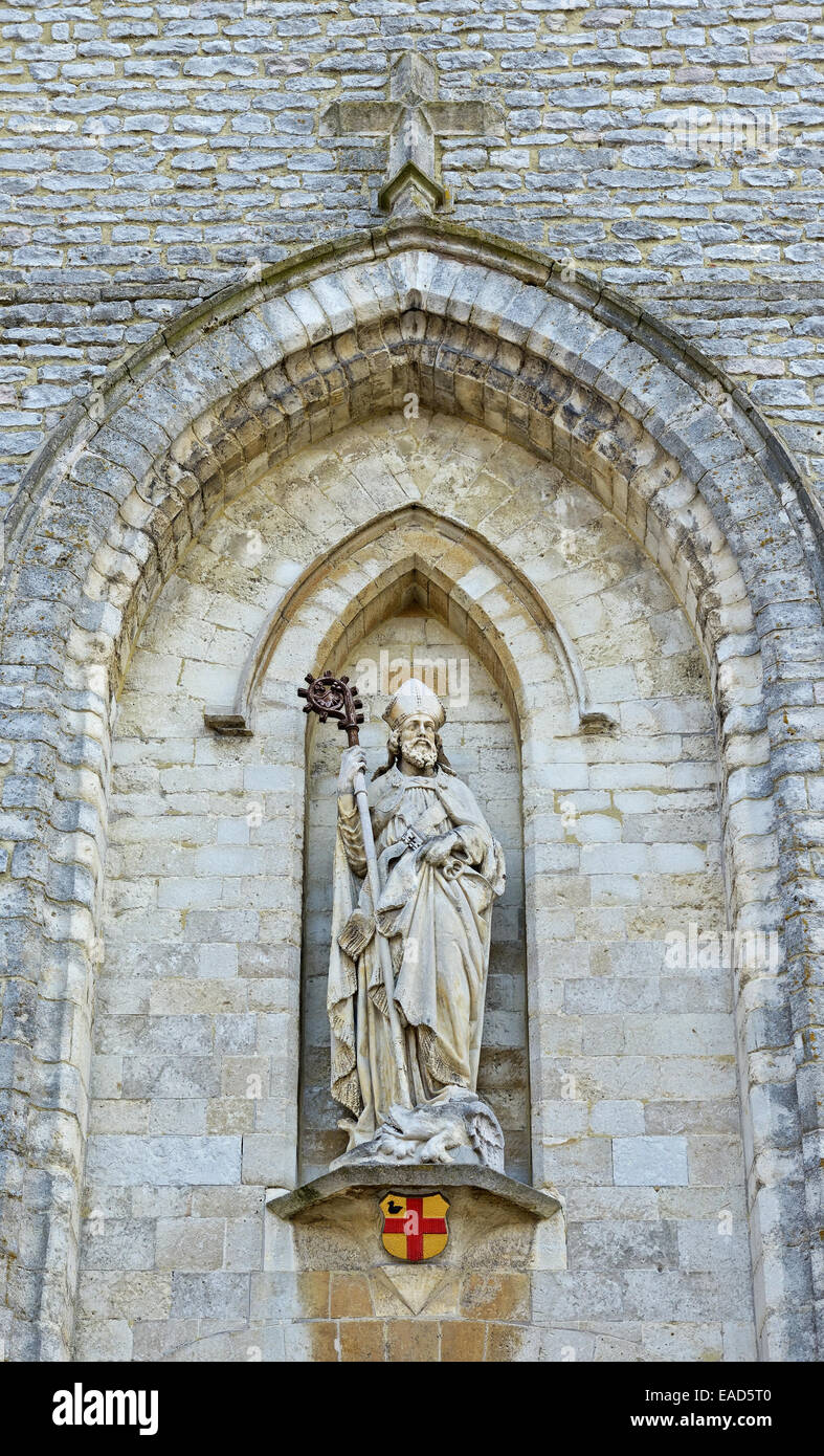Statue of the saint on entry to Saint Servatius or Sint Servaas church ...