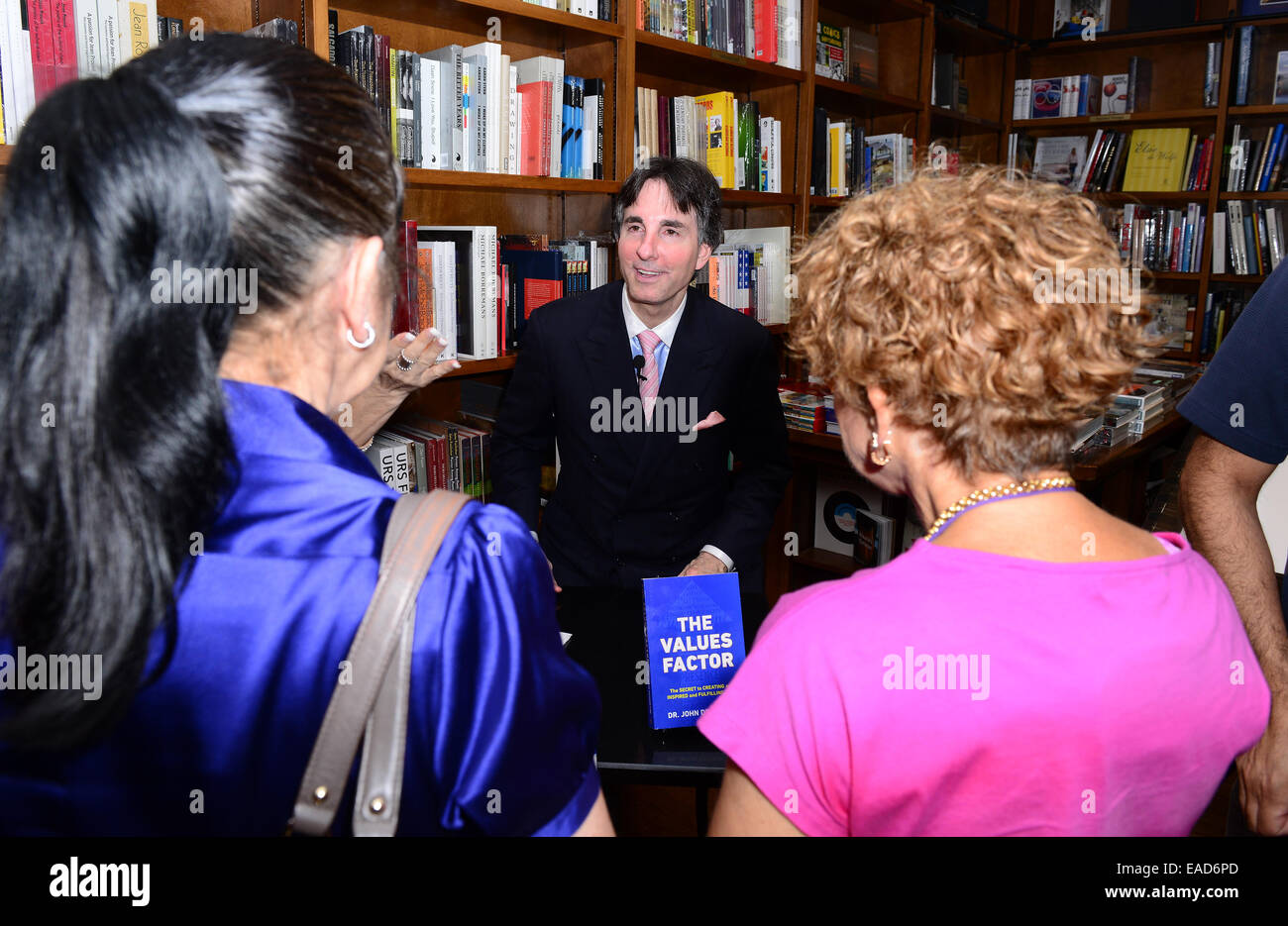 Author Dr. John Demartini signs copies of his book 'The Values Factor ...