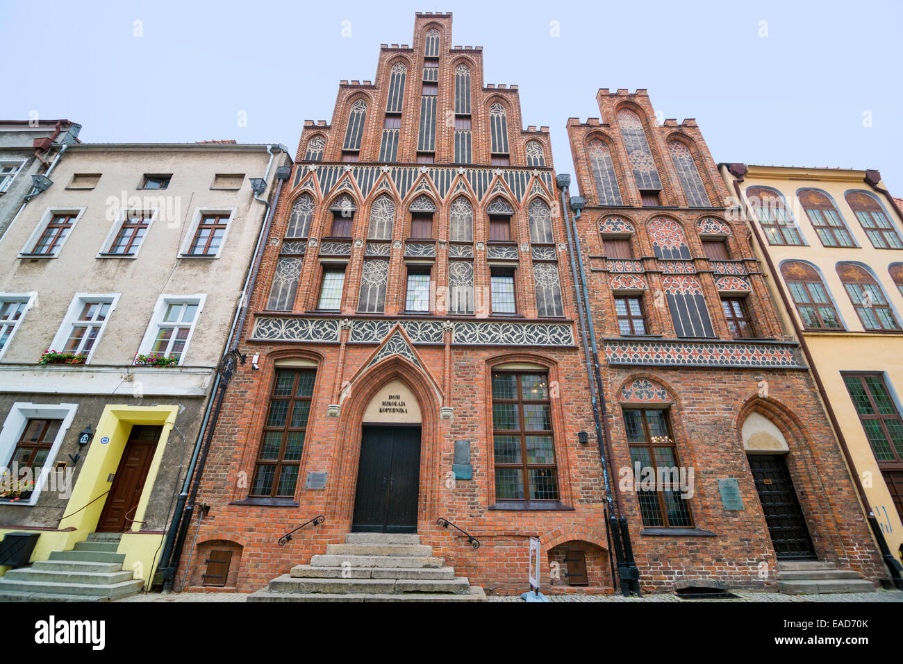 TORUN, POLAND - OCTOBER 23, 2014: Entrance to gothic house (circa XV c ...