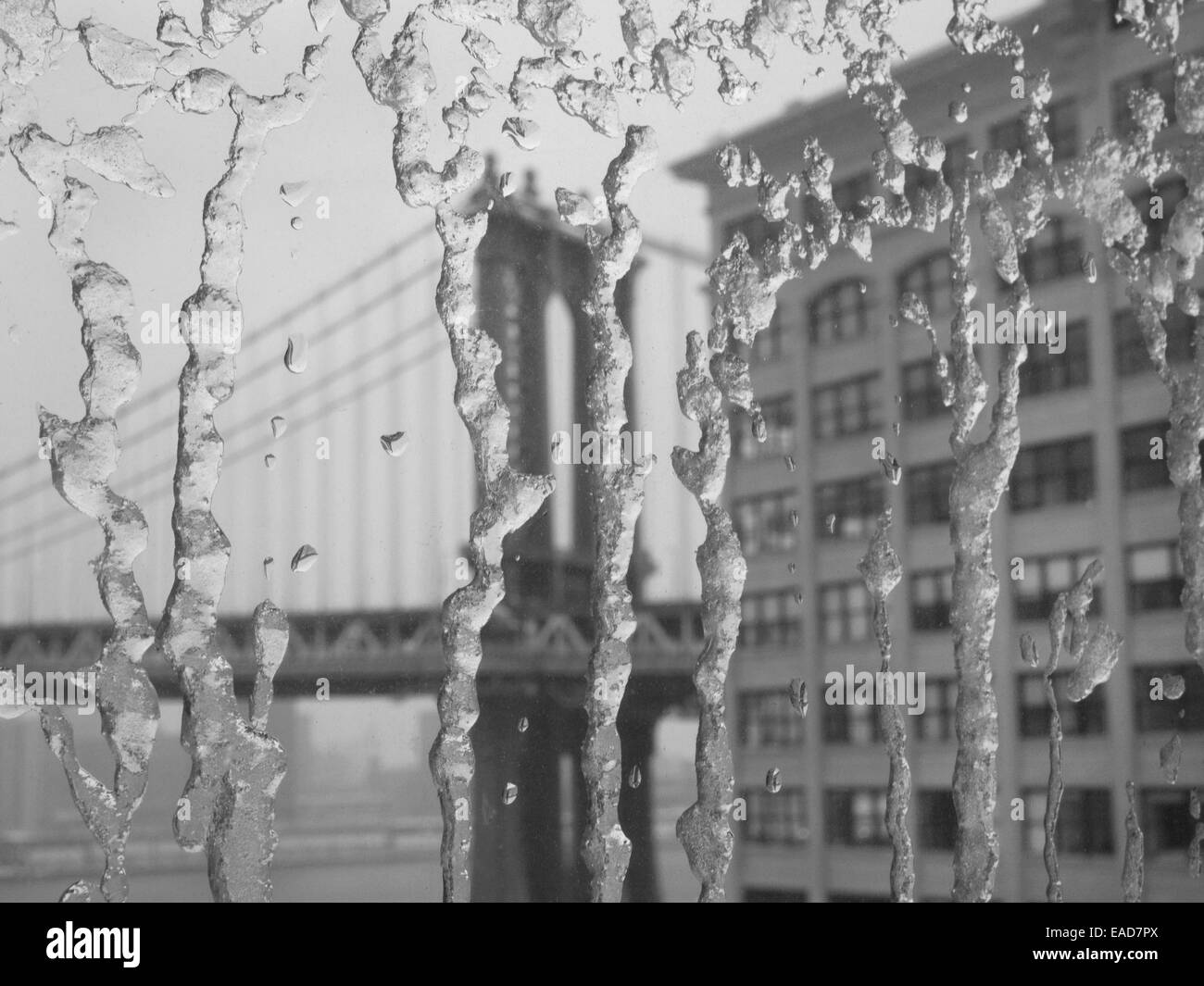 Frozen ice drips on window Stock Photo - Alamy