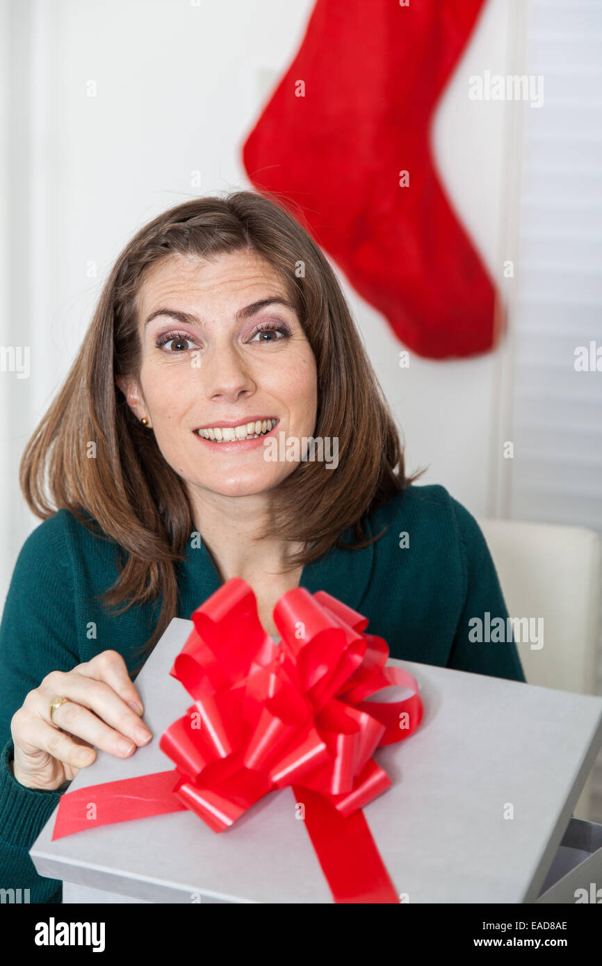 Woman opening her surprise Stock Photo - Alamy