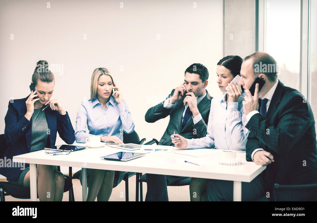 business team with smartphones having conversation Stock Photo - Alamy