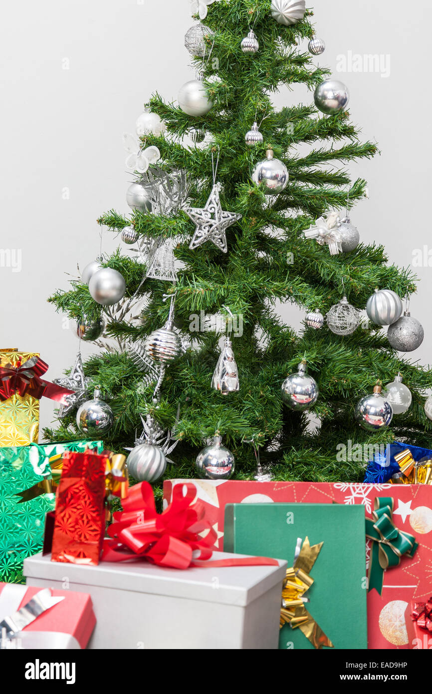 The christmas tree with presents Stock Photo - Alamy