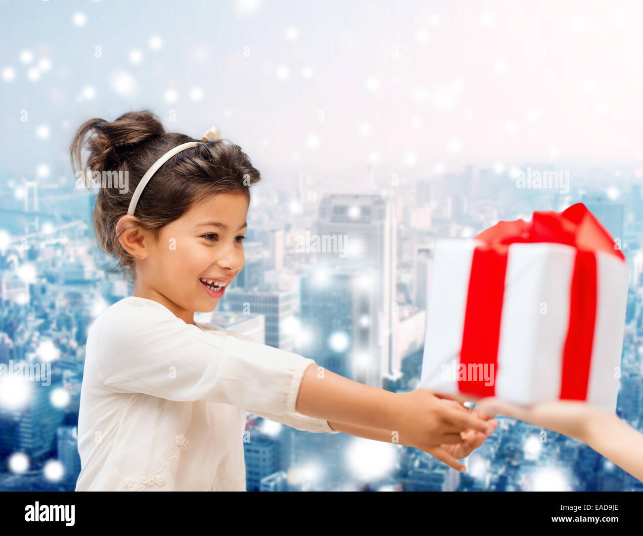 smiling little girl with gift box Stock Photo - Alamy