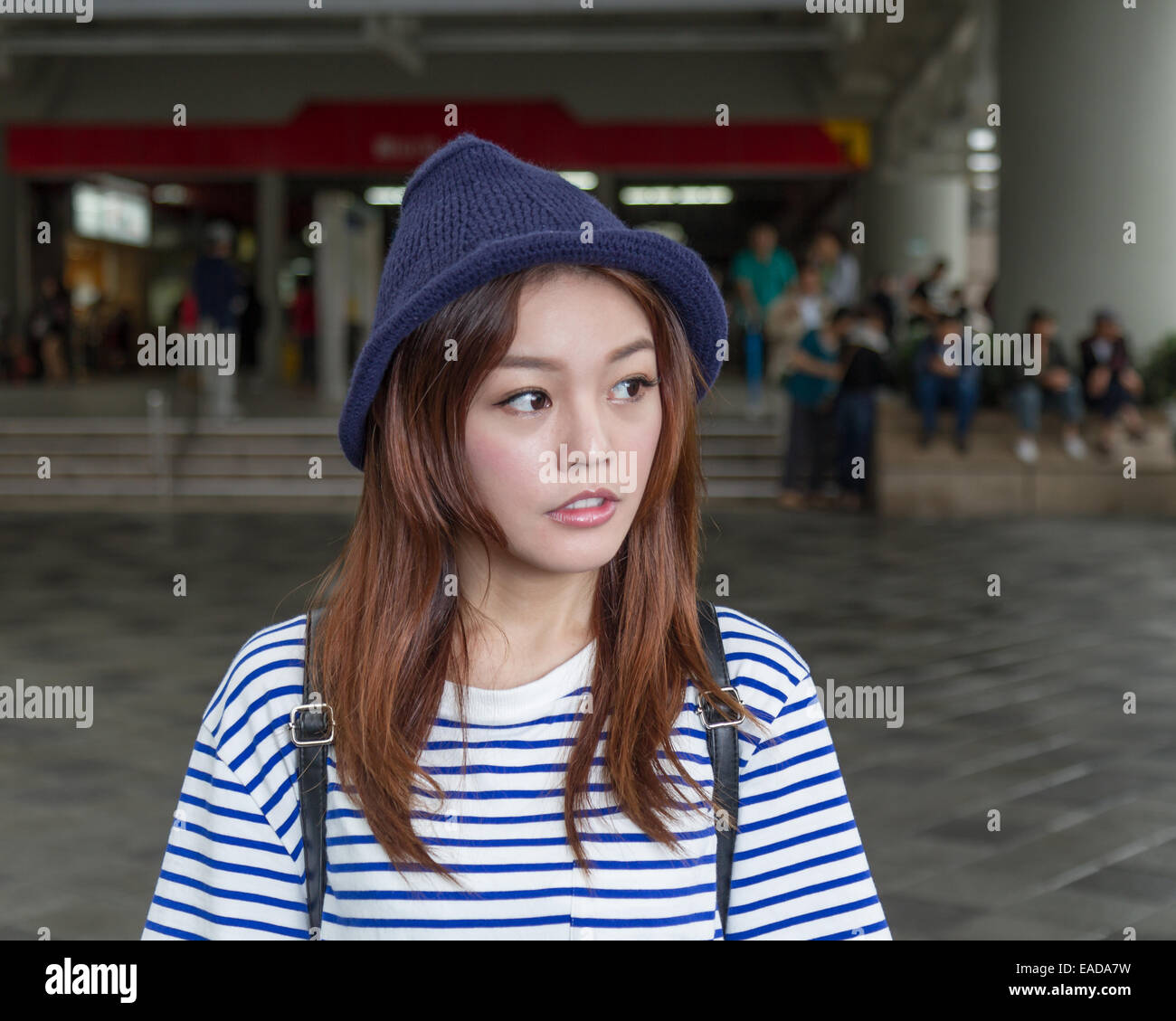 Pretty Chinese woman outside MRT subway station in Taipei Stock Photo ...