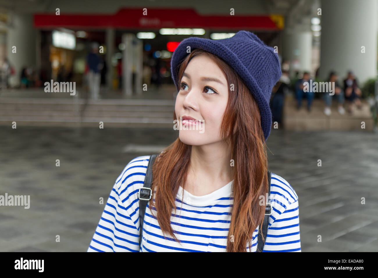 Pretty Chinese woman outside MRT subway station in Taipei Stock Photo ...