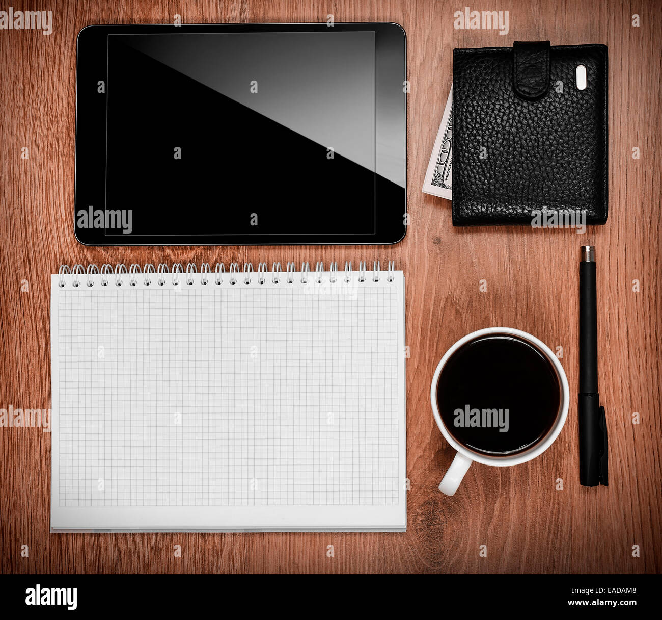 Tablet computer on the office table with notebook and pen. Business ...