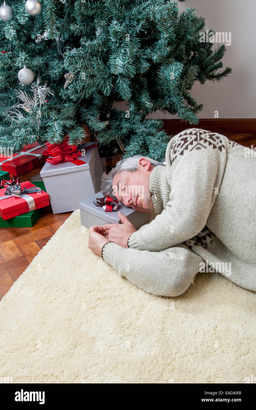 Man under christmas decoration hi-res stock photography and images - Alamy
