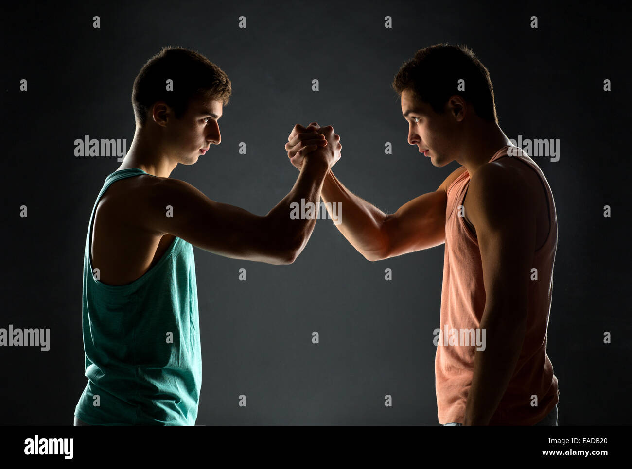 young men wrestling Stock Photo - Alamy