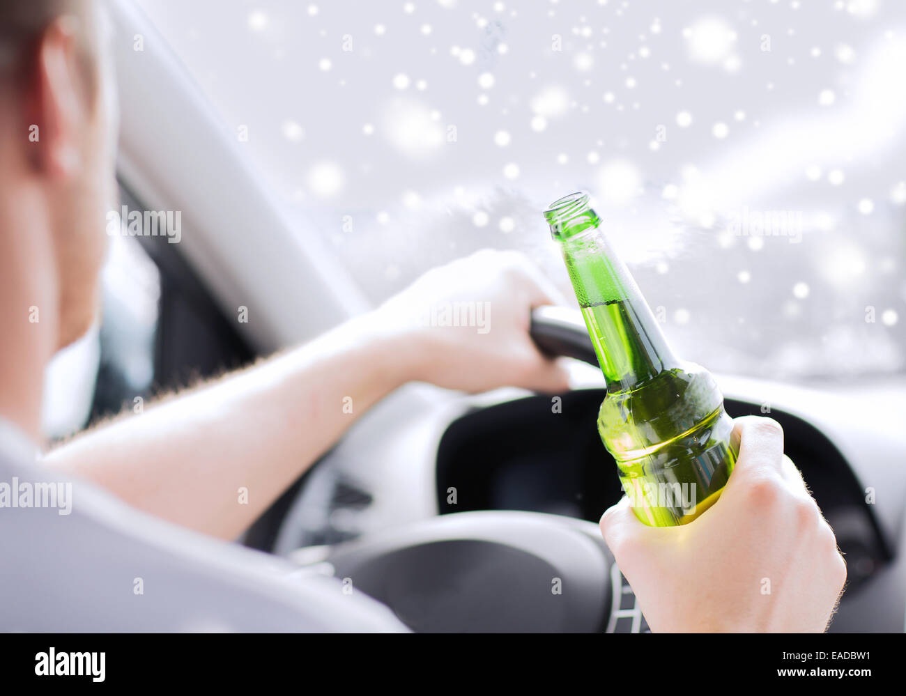 close up of man drinking alcohol while driving car Stock Photo - Alamy
